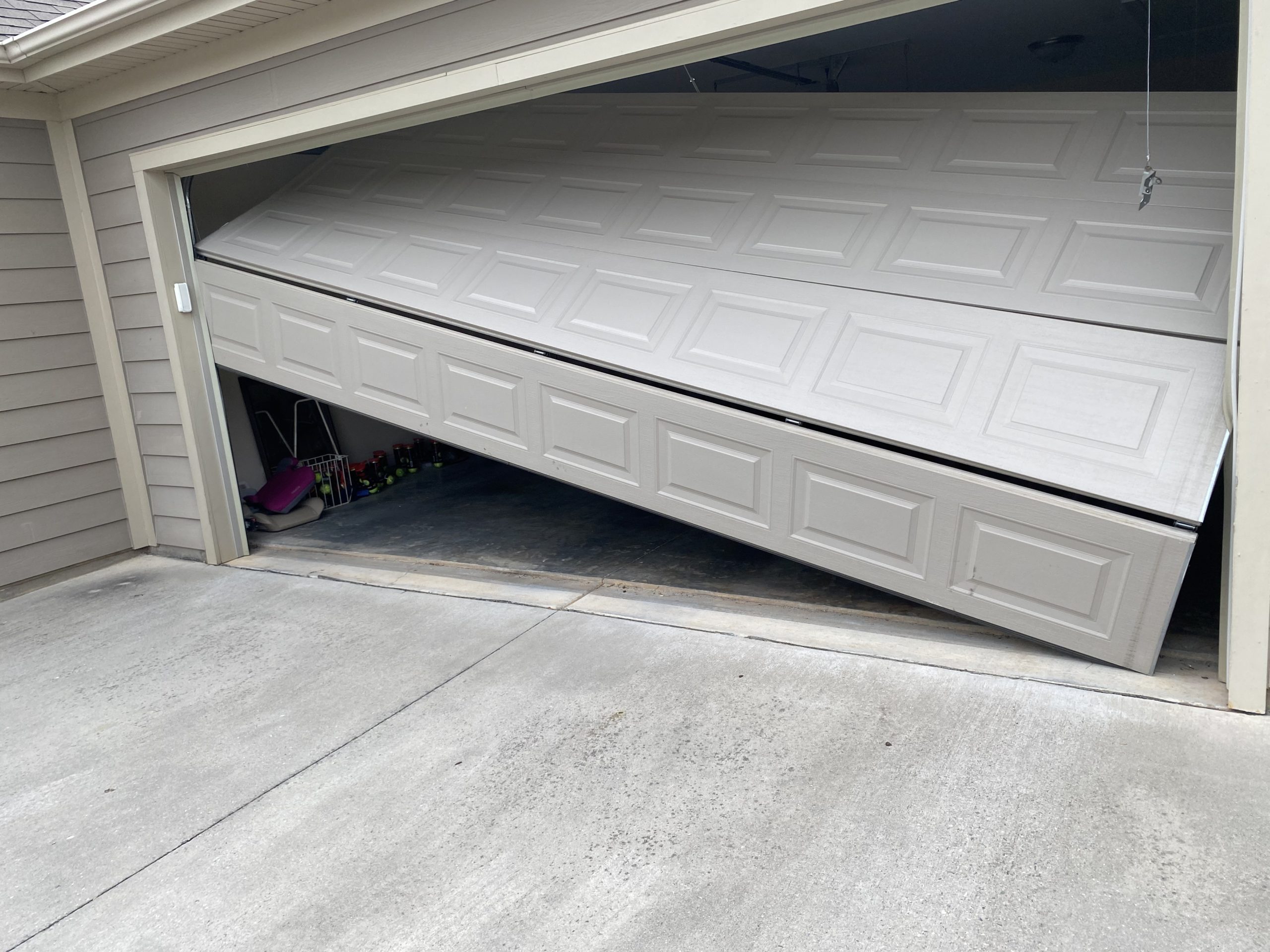 Fix Garage Door Off Track: Easy DIY Guide to Restore Operation